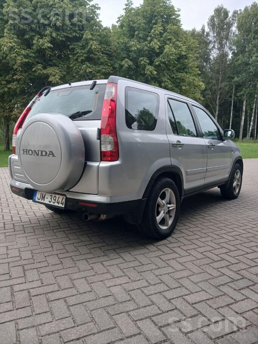 Grey Honda CR-V 2006 in Talsi, with an engine capacity of 2.00 L and mileage of 225 thousand km for 2250 €, photo 9 on AUTOMOTO.COM.LV