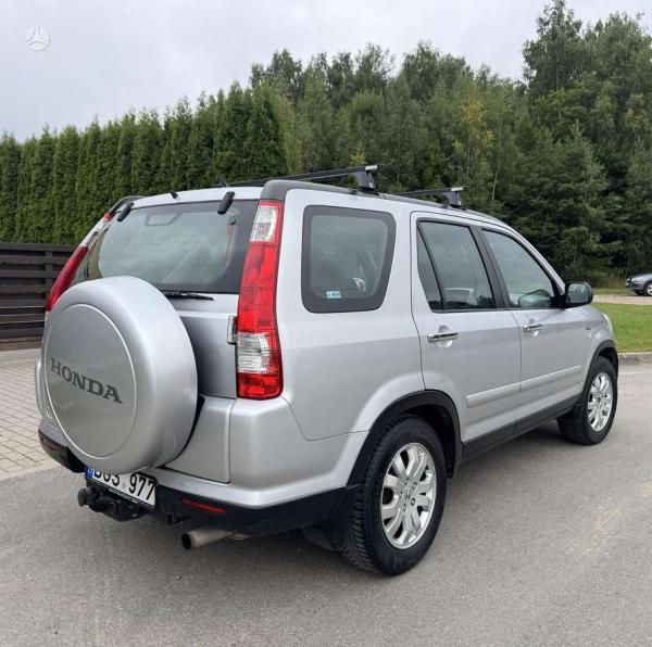 Grey Honda CR-V 2006 in Vilnius, with an engine capacity of 2.00 L and mileage of 256 thousand km for 2250 €, photo 3 on AUTOMOTO.COM.LV