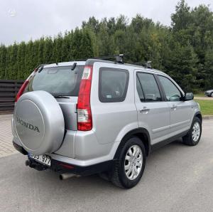 Pelēks Honda CR-V 2006 Viļņa, ar dzinēja tilpumu 2.00 L un nobraukumu 256 tūkst. km par 2250 €, foto 4 vietnē AUTOMOTO.COM.LV