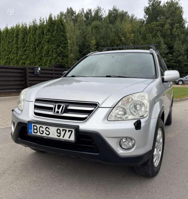 Grey Honda CR-V 2006 in Vilnius, with an engine capacity of 2.00 L and mileage of 256 thousand km for 2250 €, photo 7 on AUTOMOTO.COM.LV
