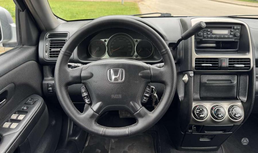 Pelēks Honda CR-V 2006 Viļņa, ar dzinēja tilpumu 2.00 L un nobraukumu 256 tūkst. km par 2250 €, foto 20 vietnē AUTOMOTO.COM.LV