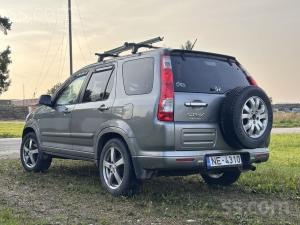 Grey Honda CR-V 2006 in Jekabpils, with an engine capacity of 2.20 L and mileage of 323 thousand km for 2650 €, photo 4 on AUTOMOTO.COM.LV
