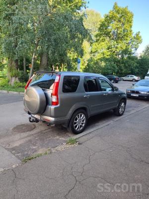 Grey Honda CR-V 2006 in Riga, with an engine capacity of 2.20 L and mileage of 314 thousand km for 3500 €, photo 4 on AUTOMOTO.COM.LV