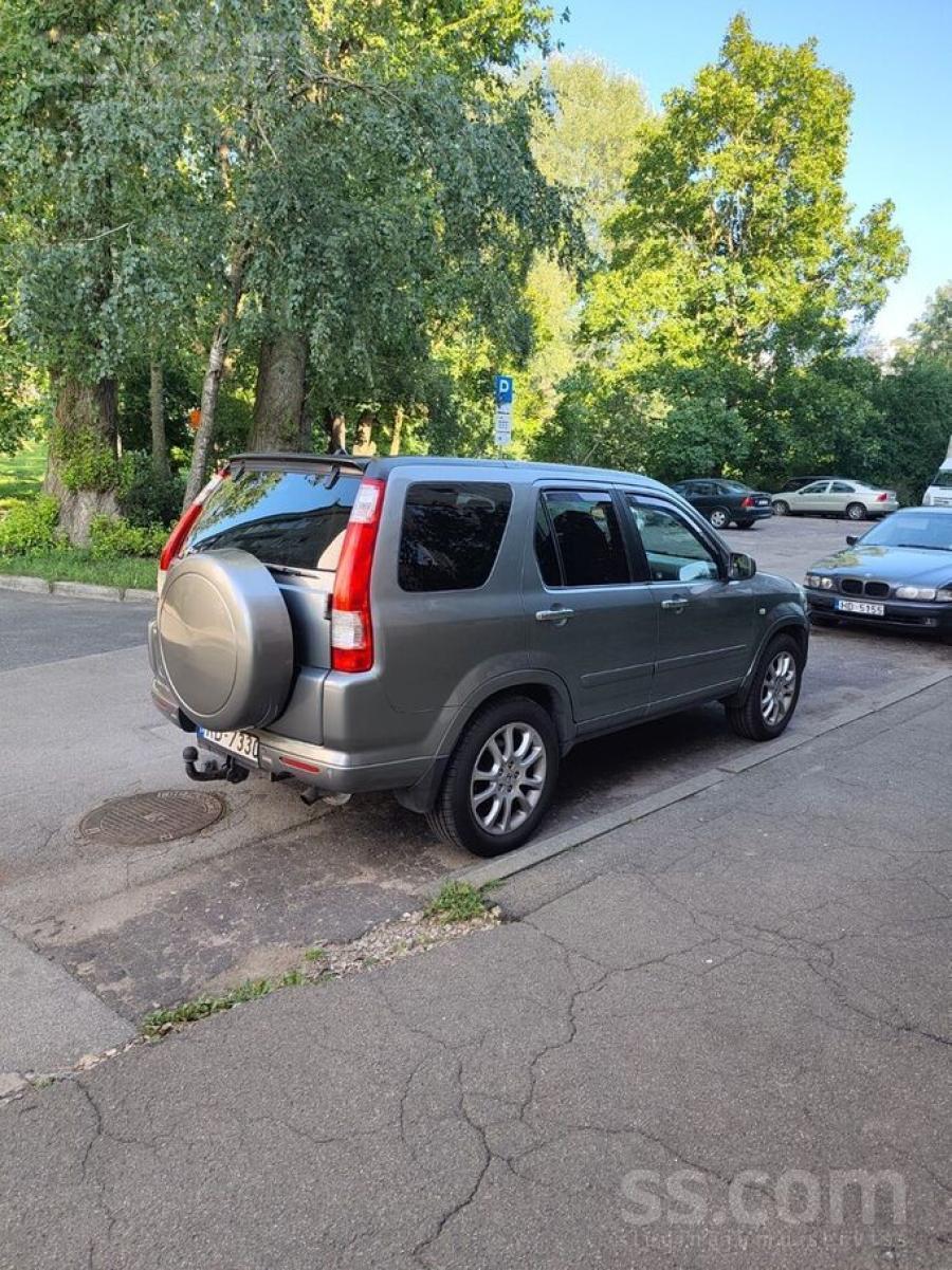 Grey Honda CR-V 2006 in Riga, with an engine capacity of 2.20 L and mileage of 314 thousand km for 3500 €, photo 4 on AUTOMOTO.COM.LV