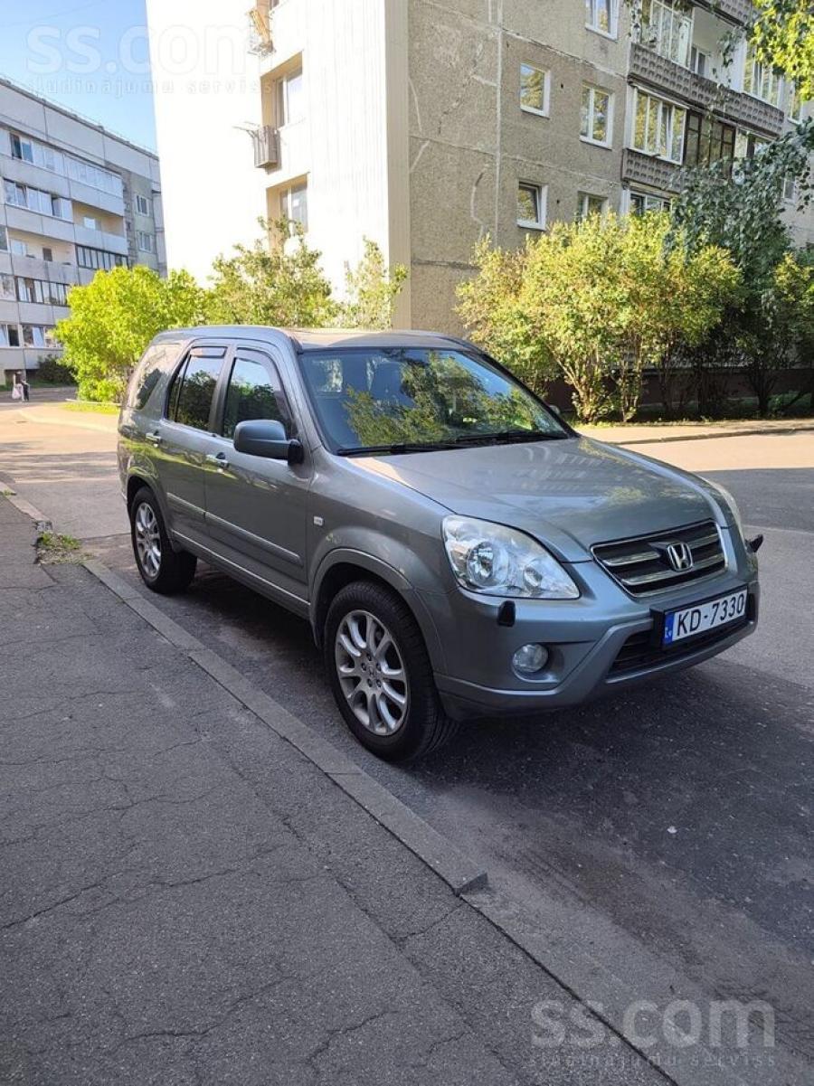 Grey Honda CR-V 2006 in Riga, with an engine capacity of 2.20 L and mileage of 314 thousand km for 3500 €, photo 6 on AUTOMOTO.COM.LV