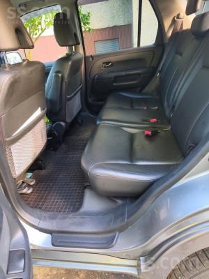 Grey Honda CR-V 2006 in Riga, with an engine capacity of 2.20 L and mileage of 314 thousand km for 3500 €, photo 8 on AUTOMOTO.COM.LV