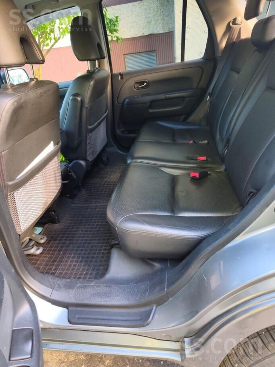 Grey Honda CR-V 2006 in Riga, with an engine capacity of 2.20 L and mileage of 314 thousand km for 3500 €, photo 8 on AUTOMOTO.COM.LV