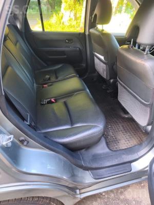 Grey Honda CR-V 2006 in Riga, with an engine capacity of 2.20 L and mileage of 314 thousand km for 3500 €, photo 12 on AUTOMOTO.COM.LV