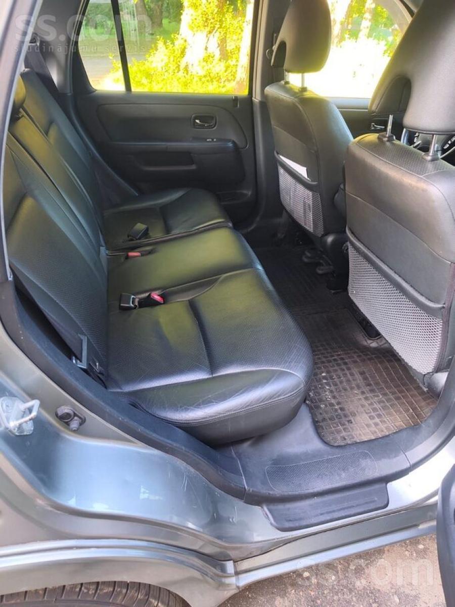 Grey Honda CR-V 2006 in Riga, with an engine capacity of 2.20 L and mileage of 314 thousand km for 3500 €, photo 12 on AUTOMOTO.COM.LV