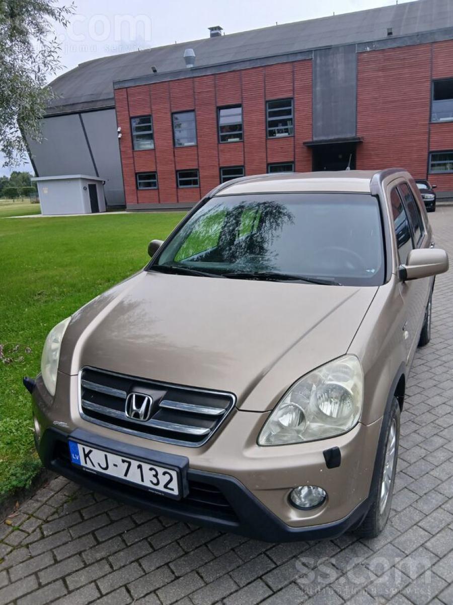 Pelēks Honda CR-V 2006 Kuldīga, ar dzinēja tilpumu 2.00 L un nobraukumu 243 tūkst. km par 1850 €, foto 1 vietnē AUTOMOTO.COM.LV