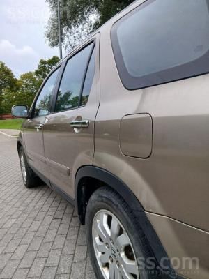 Pelēks Honda CR-V 2006 Kuldīga, ar dzinēja tilpumu 2.00 L un nobraukumu 243 tūkst. km par 1850 €, foto 4 vietnē AUTOMOTO.COM.LV