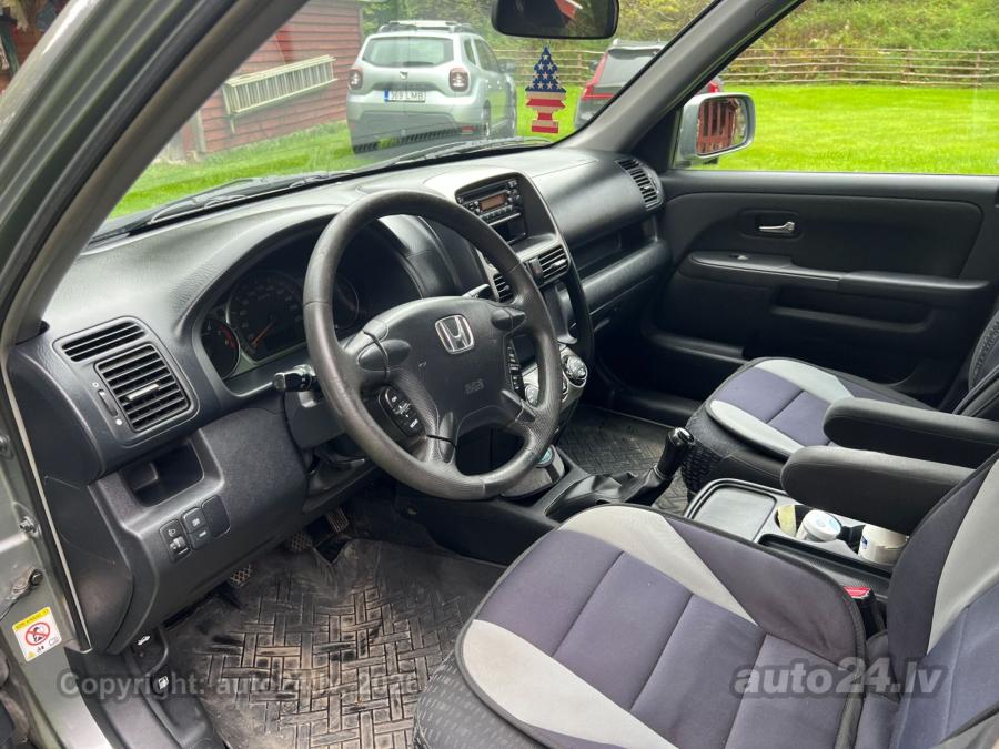 Pelēks Honda CR-V 2006 Jegeva, ar dzinēja tilpumu 2.00 L un nobraukumu 343 tūkst. km par 2999 €, foto 8 vietnē AUTOMOTO.COM.LV