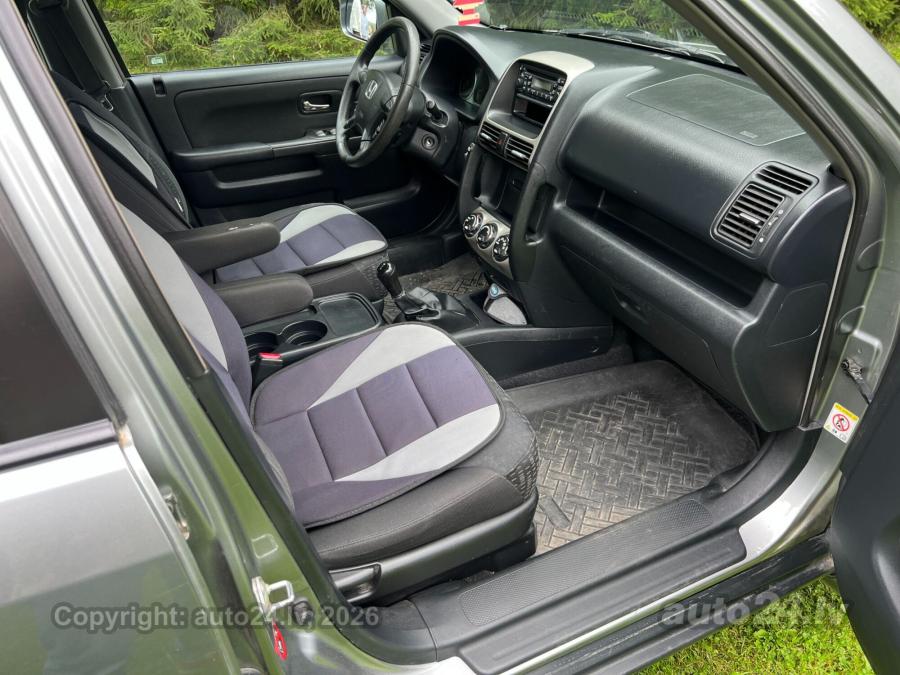Pelēks Honda CR-V 2006 Jegeva, ar dzinēja tilpumu 2.00 L un nobraukumu 343 tūkst. km par 2999 €, foto 12 vietnē AUTOMOTO.COM.LV