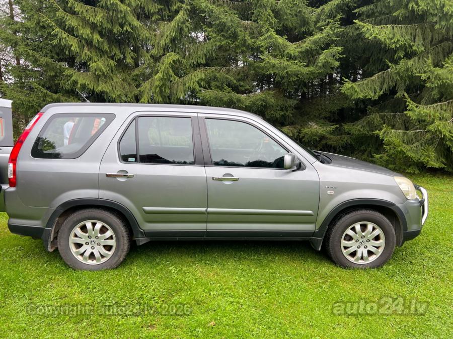 Pelēks Honda CR-V 2006 Jegeva, ar dzinēja tilpumu 2.00 L un nobraukumu 343 tūkst. km par 2999 €, foto 16 vietnē AUTOMOTO.COM.LV