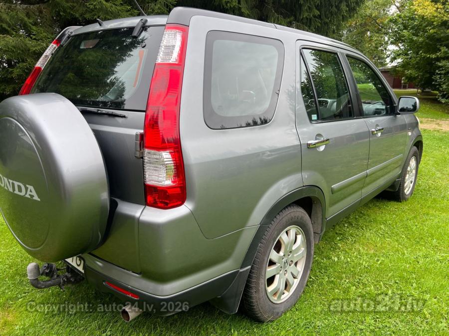 Pelēks Honda CR-V 2006 Jegeva, ar dzinēja tilpumu 2.00 L un nobraukumu 343 tūkst. km par 2999 €, foto 17 vietnē AUTOMOTO.COM.LV