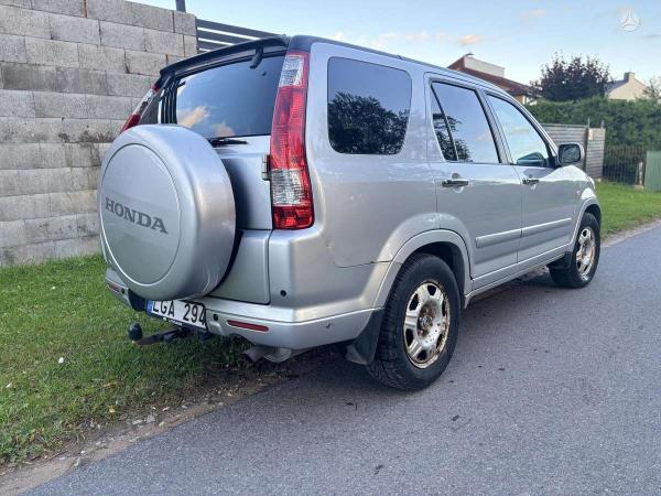 Grey Honda CR-V 2006 in Vilnius, with an engine capacity of 2.20 L and mileage of 330 thousand km for 2400 €, photo 6 on AUTOMOTO.COM.LV