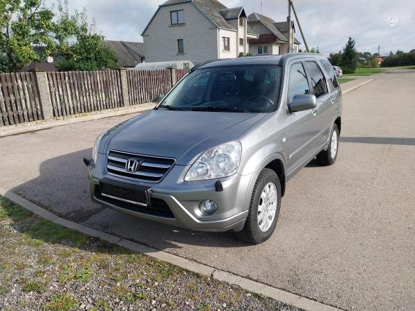 Grey Honda CR-V 2006 in Marijampole, with an engine capacity of 2.20 L and mileage of 319 thousand km for 3350 €, photo 6 on AUTOMOTO.COM.LV