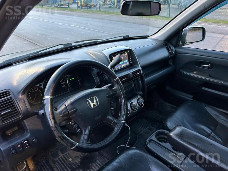 Pelēks Honda CR-V 2006 Rīga, ar dzinēja tilpumu 2.00 L un nobraukumu 346 tūkst. km par 3150 €, foto 4 vietnē AUTOMOTO.COM.LV