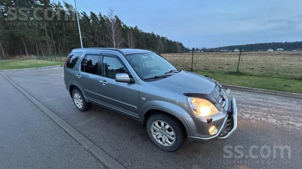 Pelēks Honda CR-V 2006 Rīga, ar dzinēja tilpumu 2.00 L un nobraukumu 346 tūkst. km par 3150 €, foto 6 vietnē AUTOMOTO.COM.LV