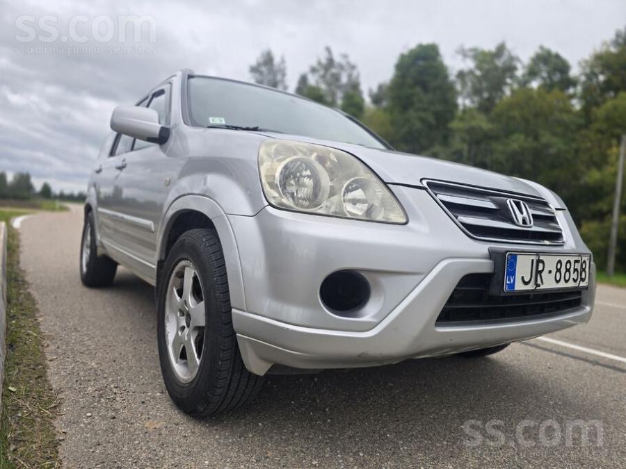 Grey Honda CR-V 2006 in Daugavpils, with an engine capacity of 2.20 L and mileage of 0 thousand km for 1499 €, photo 3 on AUTOMOTO.COM.LV