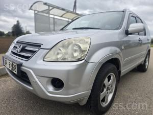 Grey Honda CR-V 2006 in Daugavpils, with an engine capacity of 2.20 L and mileage of 0 thousand km for 1499 €, photo 4 on AUTOMOTO.COM.LV