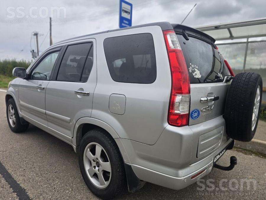 Grey Honda CR-V 2006 in Daugavpils, with an engine capacity of 2.20 L and mileage of 0 thousand km for 1499 €, photo 5 on AUTOMOTO.COM.LV