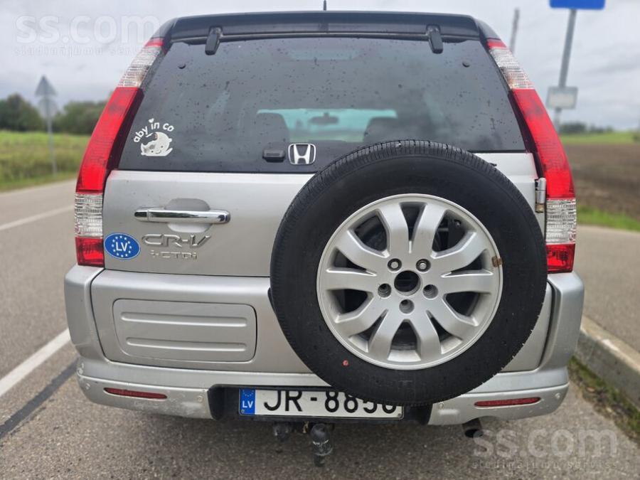 Grey Honda CR-V 2006 in Daugavpils, with an engine capacity of 2.20 L and mileage of 0 thousand km for 1499 €, photo 6 on AUTOMOTO.COM.LV