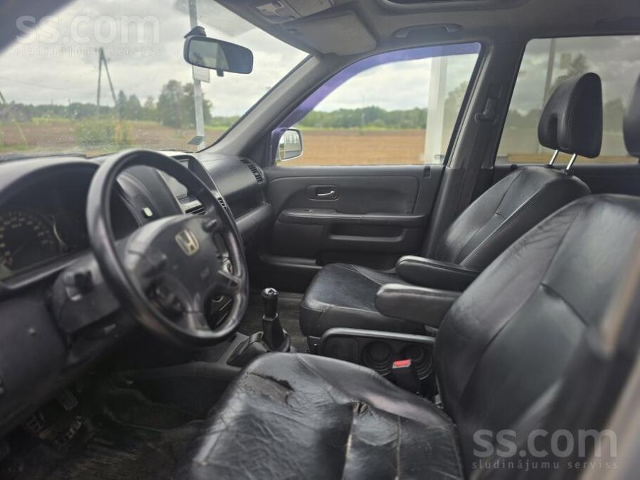 Grey Honda CR-V 2006 in Daugavpils, with an engine capacity of 2.20 L and mileage of 0 thousand km for 1499 €, photo 8 on AUTOMOTO.COM.LV