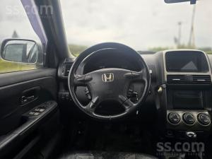 Grey Honda CR-V 2006 in Daugavpils, with an engine capacity of 2.20 L and mileage of 0 thousand km for 1499 €, photo 10 on AUTOMOTO.COM.LV