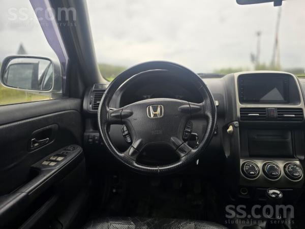 Pelēks Honda CR-V 2006 Daugavpils, ar dzinēja tilpumu 2.20 L un nobraukumu 0 tūkst. km par 1499 €, foto 10 vietnē AUTOMOTO.COM.LV