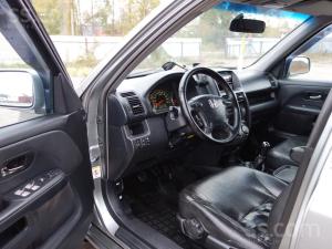Pelēks Honda CR-V 2006 Rīga, ar dzinēja tilpumu 2.20 L un nobraukumu 323 tūkst. km par 2850 €, foto 6 vietnē AUTOMOTO.COM.LV