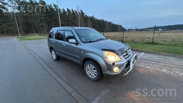 Grey Honda CR-V 2006 in Riga, with an engine capacity of 2.00 L and mileage of 346 thousand km for 2850 €, photo 7 on AUTOMOTO.COM.LV