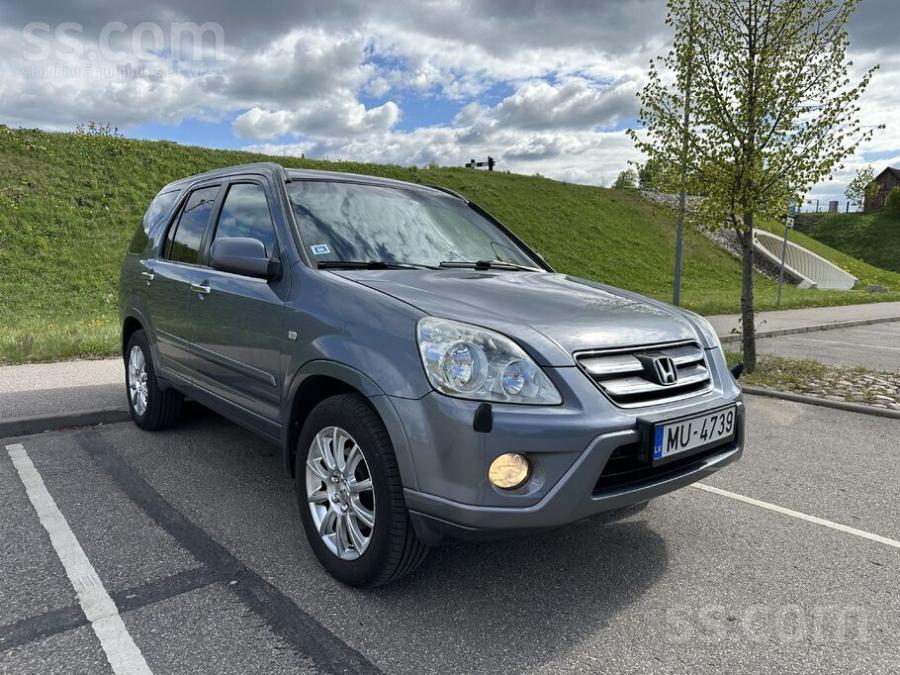 Grey Honda CR-V 2007 in Daugavpils, with an engine capacity of 2.20 L and mileage of 274 thousand km for 4500 €, photo 1 on AUTOMOTO.COM.LV