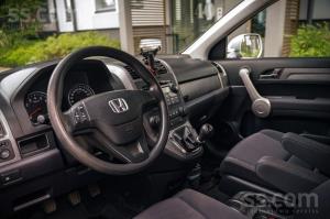 Pelēks Honda CR-V 2007 Rīga, ar dzinēja tilpumu 2.00 L un nobraukumu 277 tūkst. km par 700 €, foto 12 vietnē AUTOMOTO.COM.LV