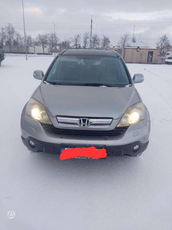 Grey Honda CR-V 2007 in Siauliai, with an engine capacity of 2.00 L and mileage of 375 thousand km for 4000 €, photo 1 on AUTOMOTO.COM.LV