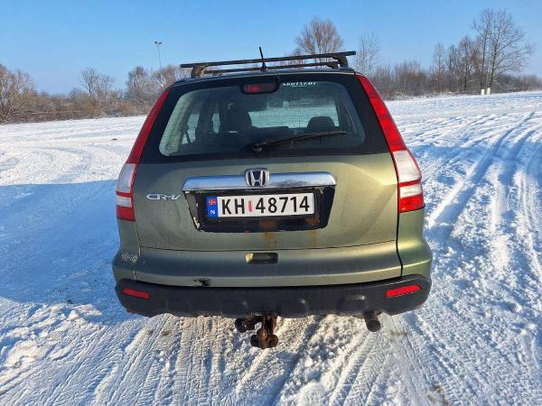 Grey Honda CR-V 2007 in Marijampole, with an engine capacity of 2.00 L and mileage of 326 thousand km for 3400 €, photo 8 on AUTOMOTO.COM.LV
