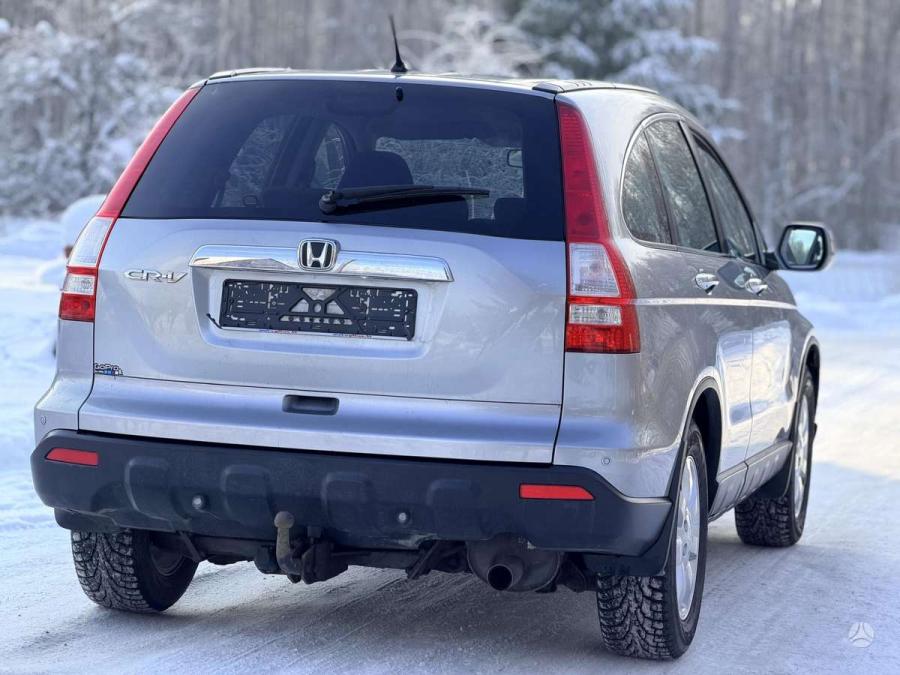 Grey Honda CR-V 2007 in Utena, with an engine capacity of 2.00 L and mileage of 318 thousand km for 4650 €, photo 6 on AUTOMOTO.COM.LV