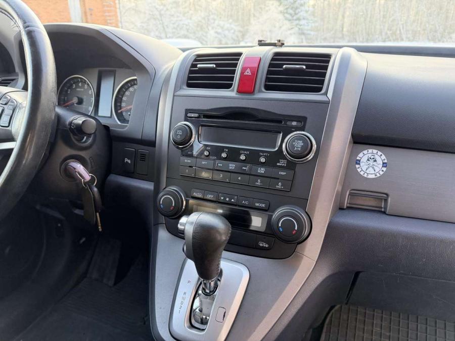 Grey Honda CR-V 2007 in Utena, with an engine capacity of 2.00 L and mileage of 318 thousand km for 4650 €, photo 19 on AUTOMOTO.COM.LV