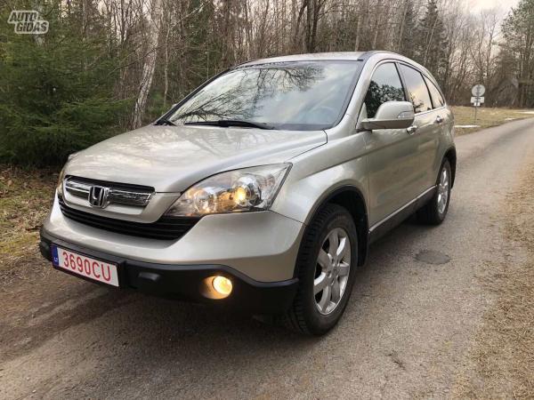 Grey Honda CR-V 2007 in Utena, with an engine capacity of 2.20 L and mileage of 240 thousand km for 4200 €, photo 1 on AUTOMOTO.COM.LV