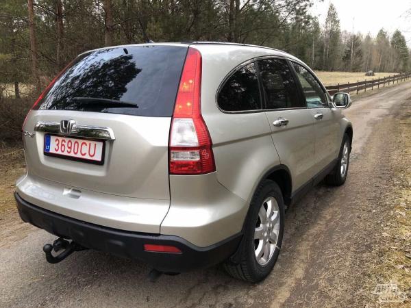 Grey Honda CR-V 2007 in Utena, with an engine capacity of 2.20 L and mileage of 240 thousand km for 4200 €, photo 3 on AUTOMOTO.COM.LV