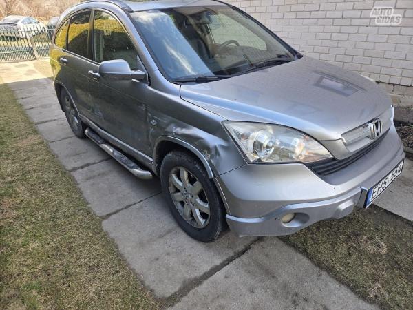 Grey Honda CR-V 2007 in Vilnius, with an engine capacity of 2.40 L and mileage of 266 thousand km for 1999 €, photo 2 on AUTOMOTO.COM.LV