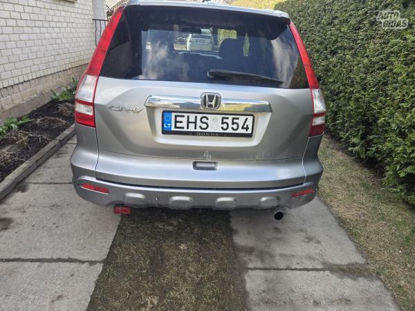 Grey Honda CR-V 2007 in Vilnius, with an engine capacity of 2.40 L and mileage of 266 thousand km for 1999 €, photo 9 on AUTOMOTO.COM.LV
