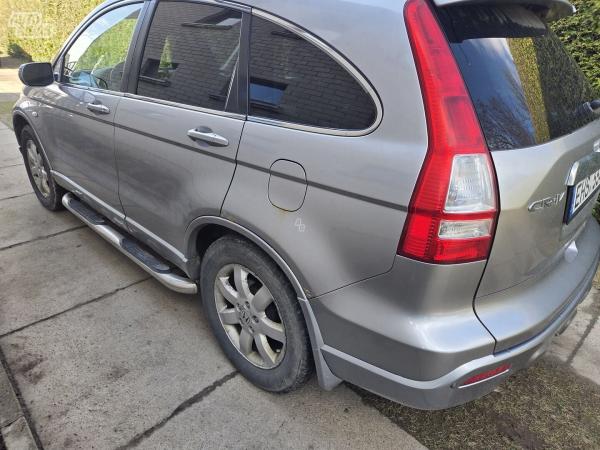 Grey Honda CR-V 2007 in Vilnius, with an engine capacity of 2.40 L and mileage of 266 thousand km for 1999 €, photo 10 on AUTOMOTO.COM.LV
