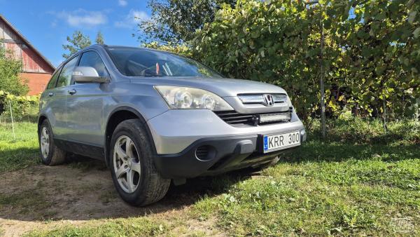 Pelēks Honda CR-V 2007 Zarasai, ar dzinēja tilpumu 2.20 L un nobraukumu 239 tūkst. km par 4200 €, foto 9 vietnē AUTOMOTO.COM.LV