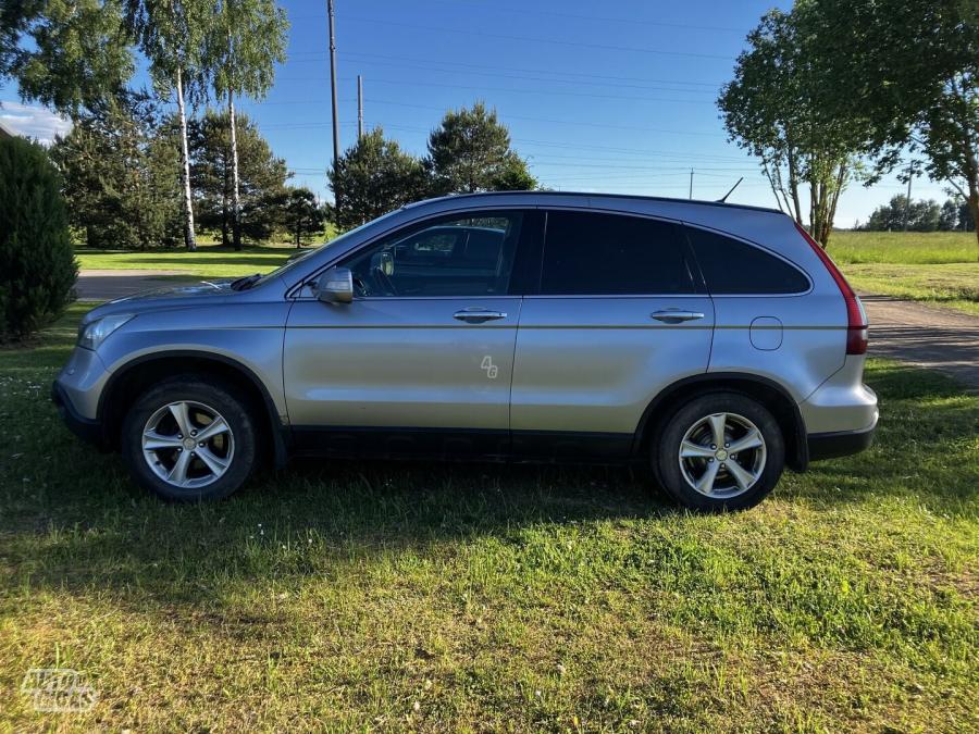 Pelēks Honda CR-V 2007 Kupiškis, ar dzinēja tilpumu 2.20 L un nobraukumu 305 tūkst. km par 3000 €, foto 4 vietnē AUTOMOTO.COM.LV