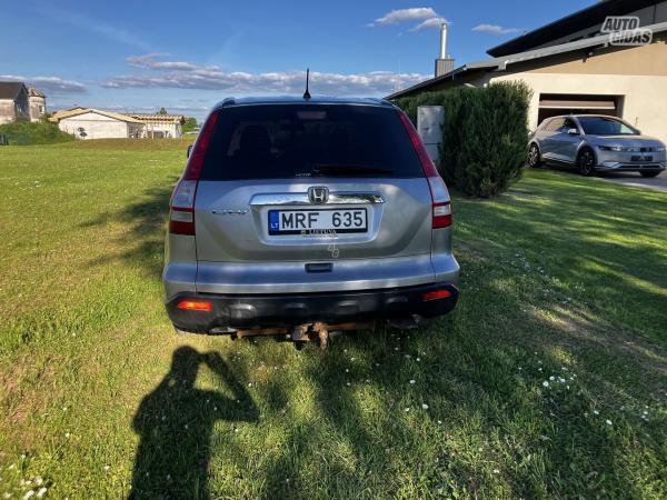 Pelēks Honda CR-V 2007 Kupiškis, ar dzinēja tilpumu 2.20 L un nobraukumu 305 tūkst. km par 3000 €, foto 4 vietnē AUTOMOTO.COM.LV