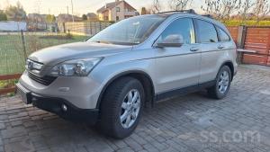 Grey Honda CR-V 2007 in Riga, with an engine capacity of 2.20 L and mileage of 298 thousand km for 3300 €, photo  on AUTOMOTO.COM.LV