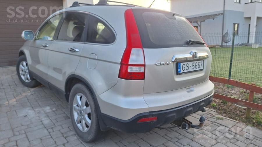 Grey Honda CR-V 2007 in Riga, with an engine capacity of 2.20 L and mileage of 298 thousand km for 3300 €, photo 3 on AUTOMOTO.COM.LV