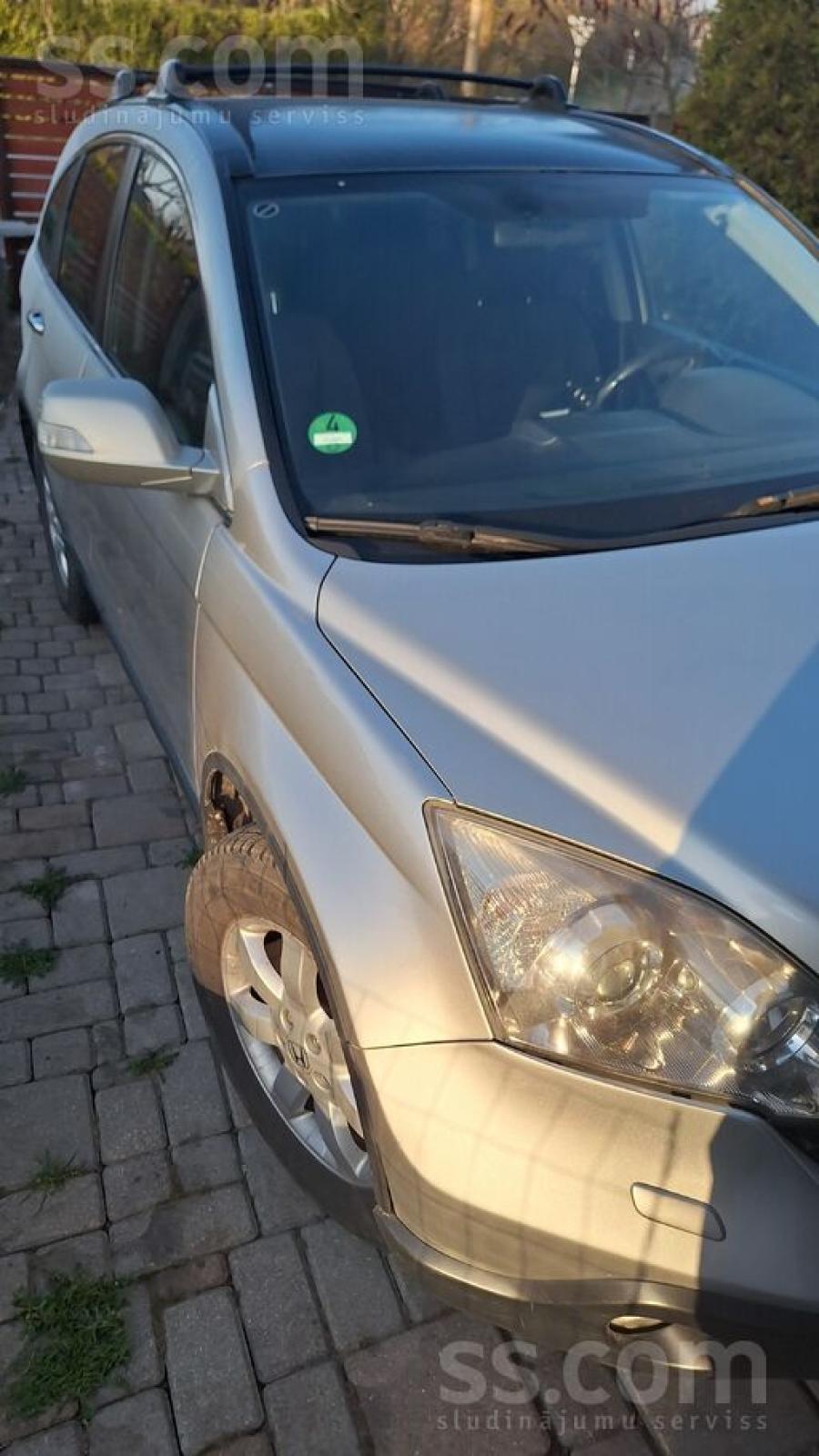 Grey Honda CR-V 2007 in Riga, with an engine capacity of 2.20 L and mileage of 298 thousand km for 3300 €, photo 5 on AUTOMOTO.COM.LV