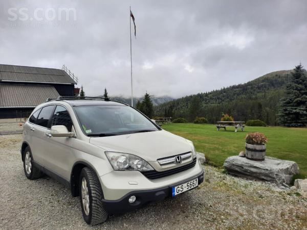 Grey Honda CR-V 2007 in Riga, with an engine capacity of 2.20 L and mileage of 298 thousand km for 3300 €, photo 8 on AUTOMOTO.COM.LV